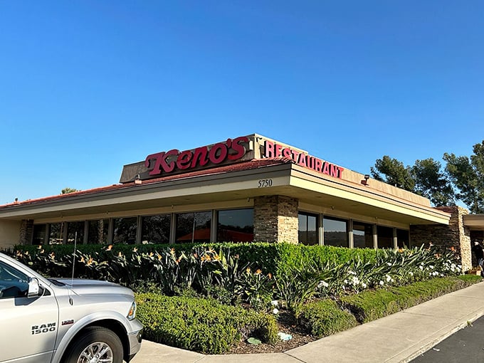 The unassuming stone facade of Keno's Restaurant stands like a culinary fortress, promising comfort food treasures within its humble walls.
