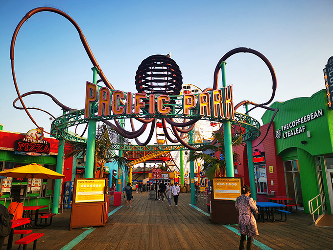 The ultimate California dream: a vibrant amusement park perched over the Pacific Ocean, where cotton candy dreams and salty breezes create perfect seaside memories.