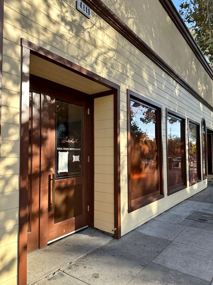 The unassuming cream exterior of Burdell belies the culinary magic happening inside. Like finding a secret doorway to flavor paradise in Oakland.