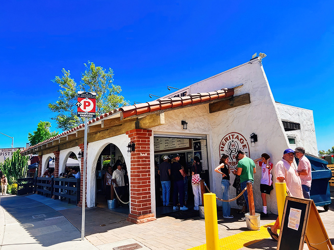 The pilgrimage begins here: Heritage Barbecue's unassuming exterior belies the smoky treasures within. That line? Worth every minute of the wait.