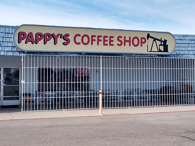 The unassuming blue-roofed exterior of Pappy's Coffee Shop stands like a culinary lighthouse in Bakersfield, promising honest food without the fanfare.