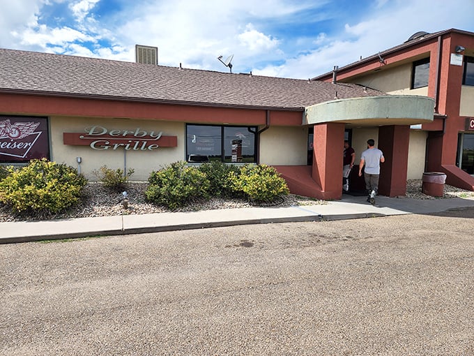 The Derby Grille stands ready for hungry visitors, with motorcycles lined up outside like dinner guests who couldn't wait to get a table.
