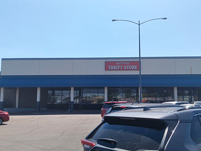 The blue awning of Mile High Thrift beckons like a bargain-hunter's lighthouse, guiding thrifty souls to shores of unexpected treasures.