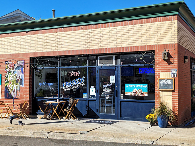 The iconic blue awning of Freskos stands out like a beacon of Mediterranean promise, complete with sunny outdoor seating for those perfect Connecticut afternoons.