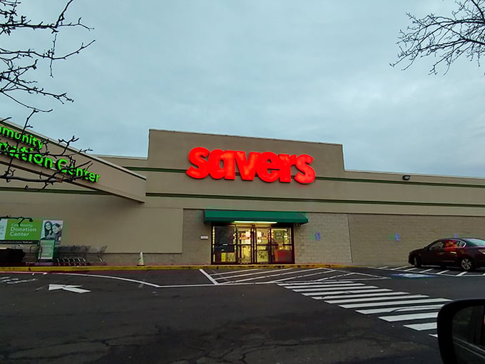 The iconic red Savers sign beckons like a lighthouse for bargain hunters. This unassuming exterior houses treasures waiting to be discovered by savvy Connecticut shoppers.