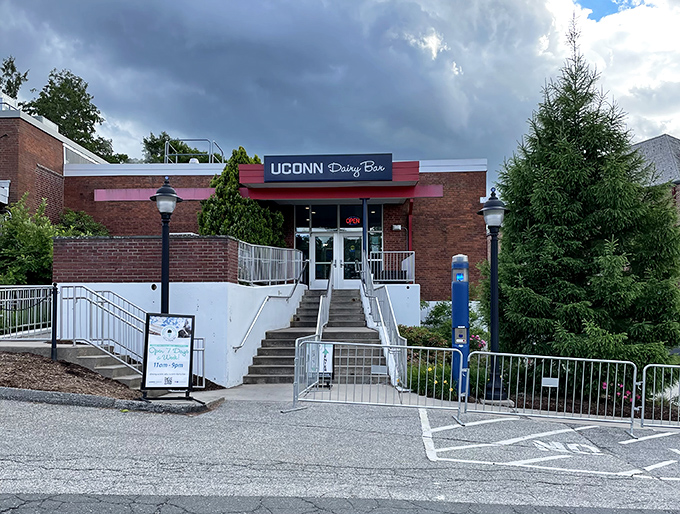 The UConn Dairy Bar stands like a beacon of frozen happiness, promising sweet relief from Connecticut summer heat and academic stress alike.