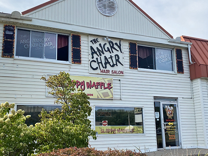 The unassuming exterior of The Sloppy Waffle shares space with The Angry Chair Salon—a pairing that somehow makes perfect sense in Connecticut's charming landscape.