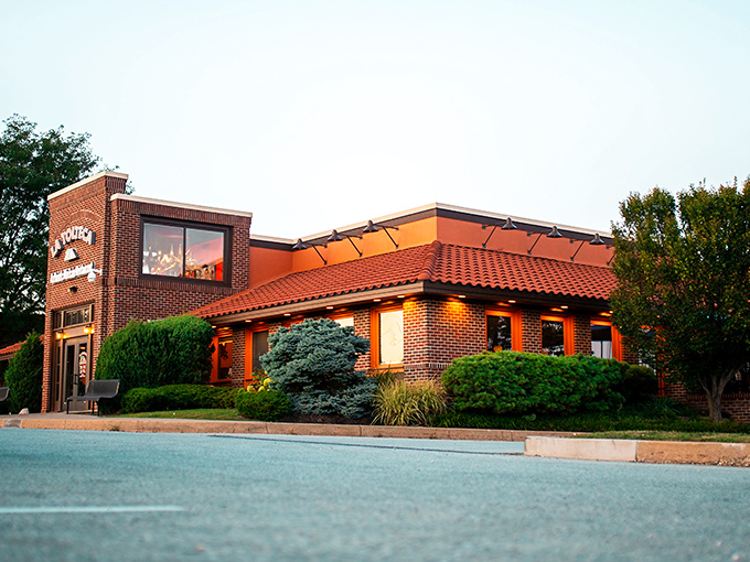 La Tolteca's sunny yellow exterior with terracotta roof stands like a beacon of culinary promise against Delaware's sky. No architectural awards here&mdash;just the promise of authentic flavors inside.