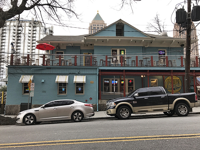 The little blue building that could. Nestled among Atlanta's skyscrapers, Steamhouse Lounge's charming exterior promises seafood treasures within those modest walls.