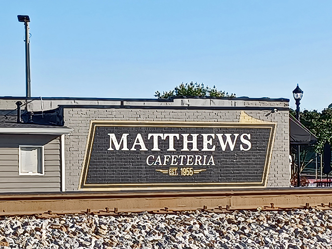 The classic black and white awning at Matthews isn't just a shelter &ndash; it's a beacon of hope for hungry souls seeking Southern salvation.