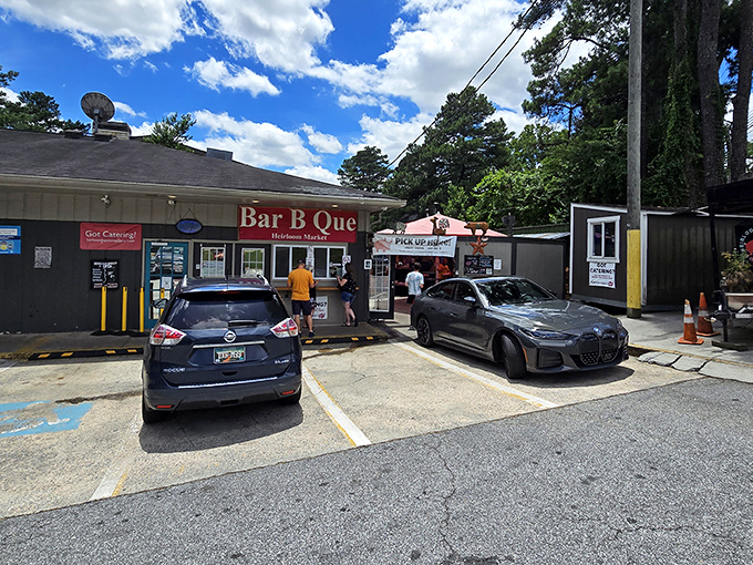 The unassuming storefront belies the culinary treasures within. Like finding a Picasso at a yard sale, this humble exterior hides Atlanta's barbecue royalty.