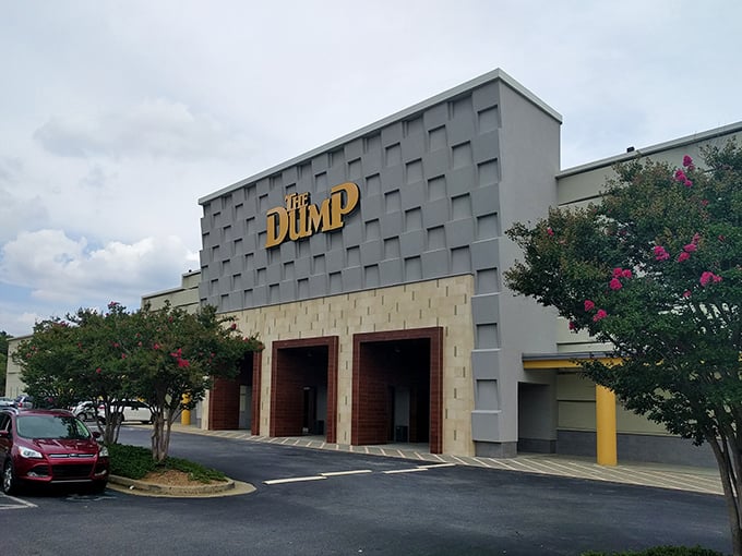 The iconic gray facade with bold yellow lettering announces you've arrived at furniture paradise, not an actual waste disposal site.