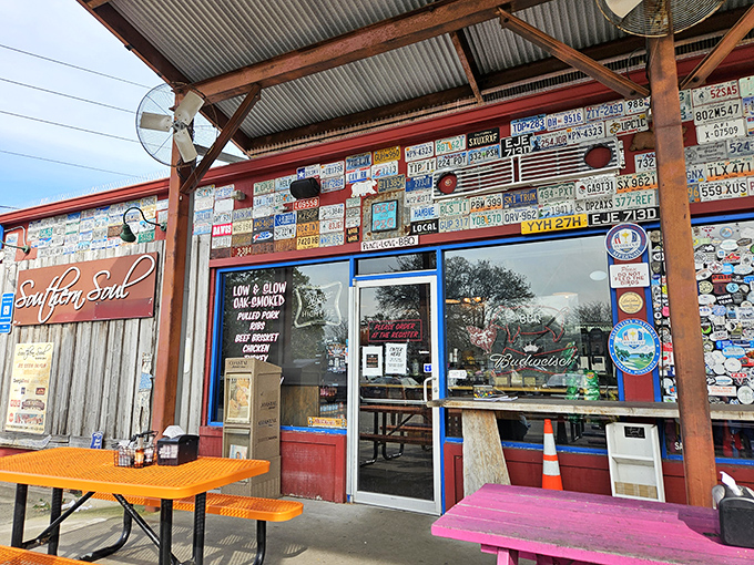 The pilgrimage begins here. Southern Soul's weathered exterior and license plate collection tell you immediately: this isn't just dinner, it's a destination. 