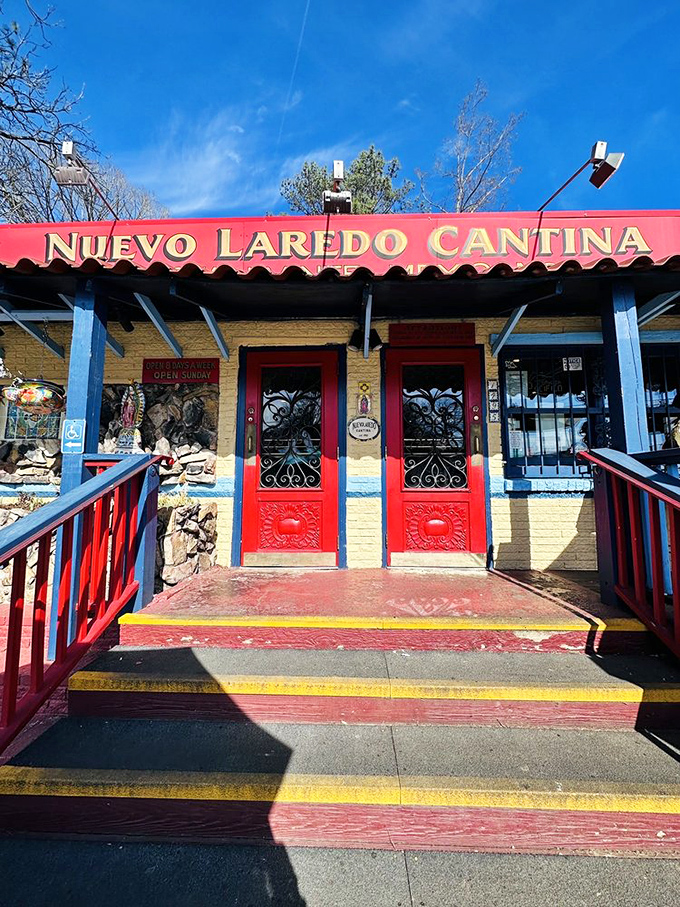 The unassuming exterior of Nuevo Laredo Cantina beckons with its vibrant red doors and rustic stone fa&ccedil;ade&mdash;a colorful oasis amid Atlanta's industrial district.