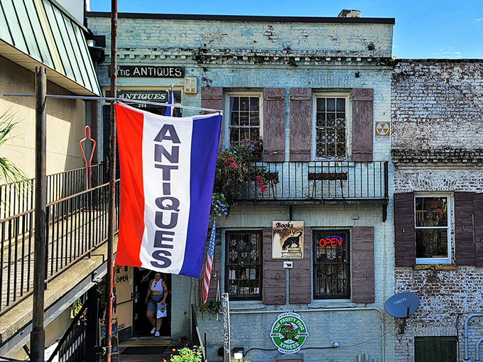 The unassuming castle of wood and wonder. Jere's Antiques' exterior gives little hint of the mahogany motherlode waiting just beyond those doors.