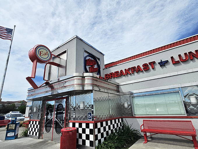 The bright red "FOOD ★ FUN ★ FIFTIES" sign isn't just advertising—it's a time portal promising your stomach the vacation it deserves.