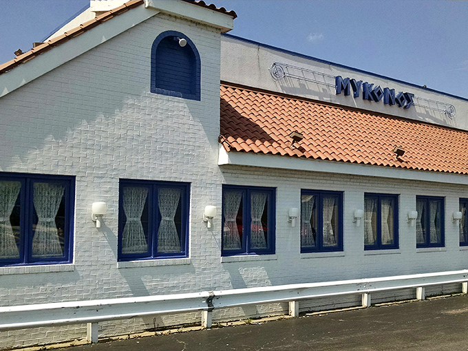 The white-washed exterior with blue trim makes Mykonos stand out in Niles like a Mediterranean postcard come to life. Greek island vibes without the airfare!