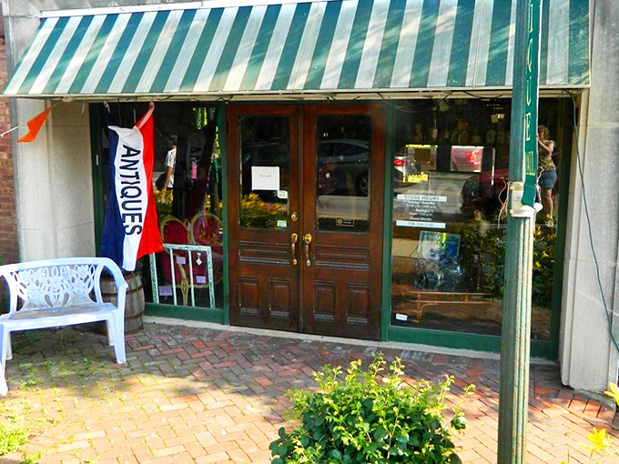 A treasure hunter's first glimpse of paradise. The brick storefront with its vibrant garden welcomes visitors like a time portal disguised as a neighborhood shop.