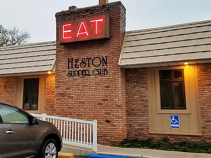 The unassuming exterior of Heston Supper Club beckons like an old friend, promising comfort and satisfaction behind its wooden facade.