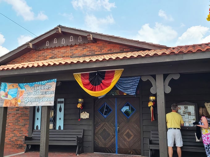 The Bavarian-style exterior of Schnitzelbank isn't just architectural flair&mdash;it's your first clue that authentic German goodness awaits inside. The clock tower practically screams "time for pretzels!"