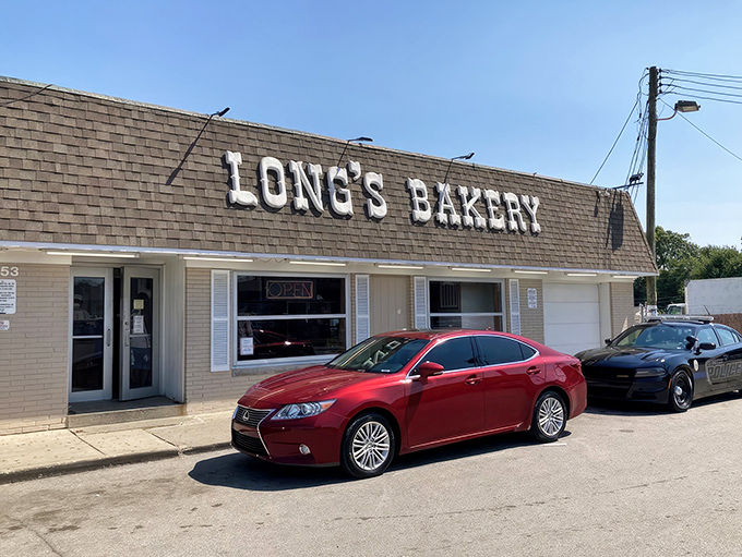 The unassuming exterior of Long's Bakery belies the sugar-fueled magic happening inside. Like finding a winning lottery ticket in your coat pocket.