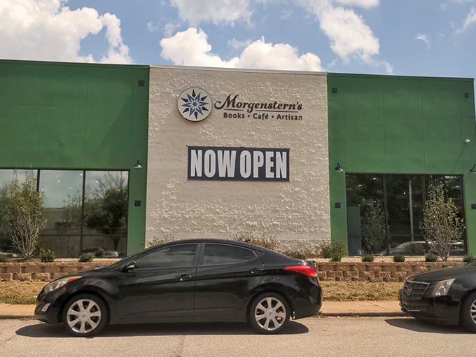 The distinctive green and white exterior of Morgenstern's stands like a beacon for book lovers, promising literary treasures within its welcoming walls.