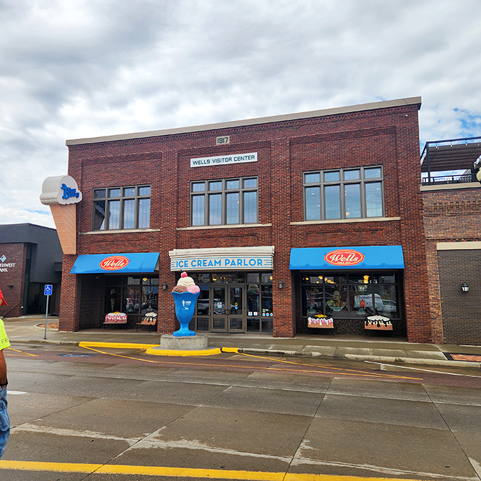 The brick fa&ccedil;ade of Wells Visitor Center stands proudly in downtown Le Mars, with that giant ice cream cone sculpture practically winking at passersby.