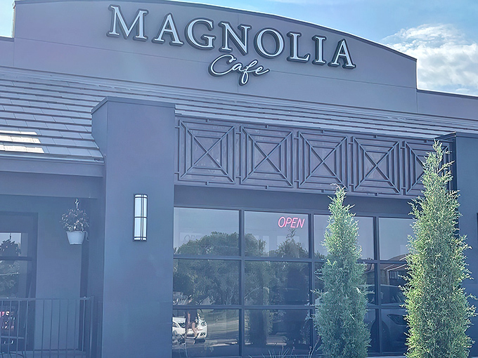 The sleek gray exterior of Magnolia Cafe stands like a culinary beacon in Wichita, promising delicious adventures within. That evergreen isn't just decoration&mdash;it's your first hint of the freshness awaiting inside.