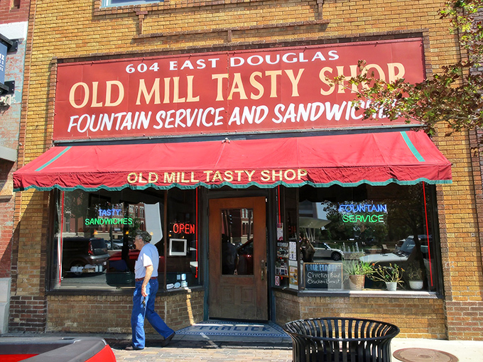 The yellow brick fa&ccedil;ade and classic red awning of Old Mill Tasty Shop isn't just a storefront&mdash;it's a time machine disguised as a downtown Wichita landmark.