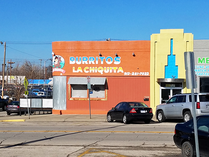 The bright blue entrance against brick-red walls isn't just eye-catching&mdash;it's a beacon for burrito lovers across Kansas City. No fancy frills, just fantastic food awaiting inside. 