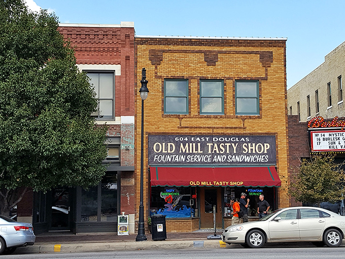 The yellow brick fa&ccedil;ade and classic red awning of Old Mill Tasty Shop isn't just a storefront&mdash;it's a time machine disguised as a downtown Wichita landmark.