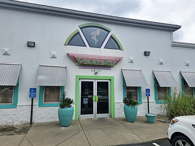The turquoise planters standing guard at Flamingo Row's entrance are like tropical sentinels, welcoming you to this Kentucky-meets-Caribbean oasis in Paducah.
