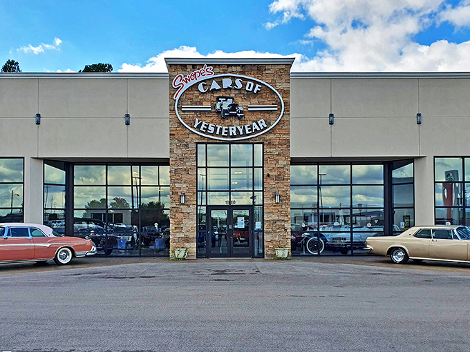 The stone-accented entrance to Swope's Cars of Yesteryear Museum stands like a portal to automotive history, promising chrome-plated treasures within.