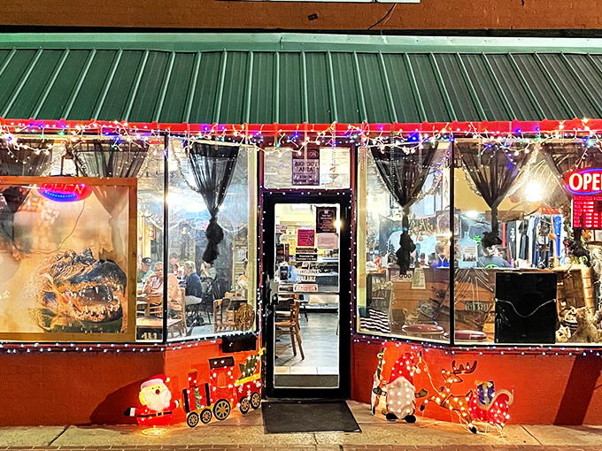 Festive lights and a giant alligator welcome you to this cozy diner where holiday cheer and hearty meals await inside.