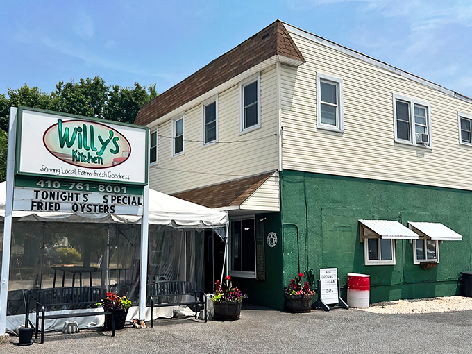 The mint-green exterior of Willy's Kitchen stands like a culinary lighthouse in Glen Burnie, promising farm-fresh goodness and tonight's special: fried oysters that would make Poseidon jealous.