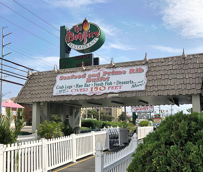 The iconic green Bonfire sign beckons hungry travelers like a lighthouse for seafood lovers on Ocean City's Coastal Highway.