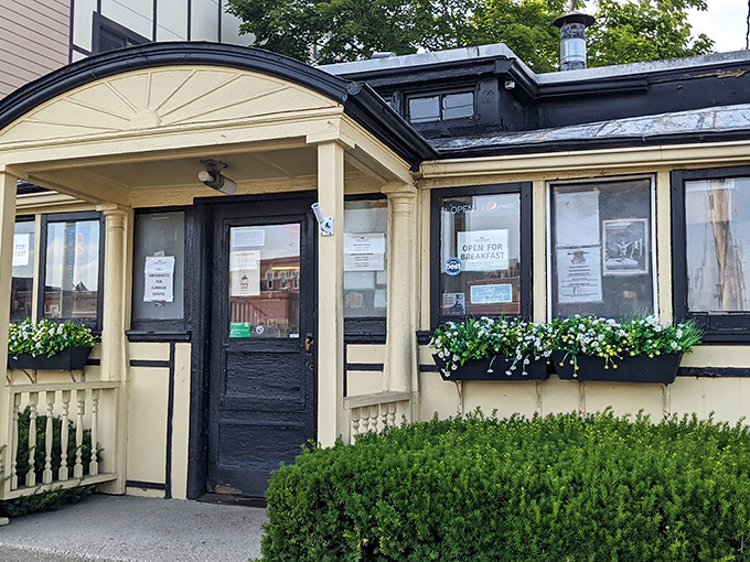The little yellow diner that could! Casey's charming exterior in Natick promises a time-traveling culinary experience that's kept locals coming back for generations.