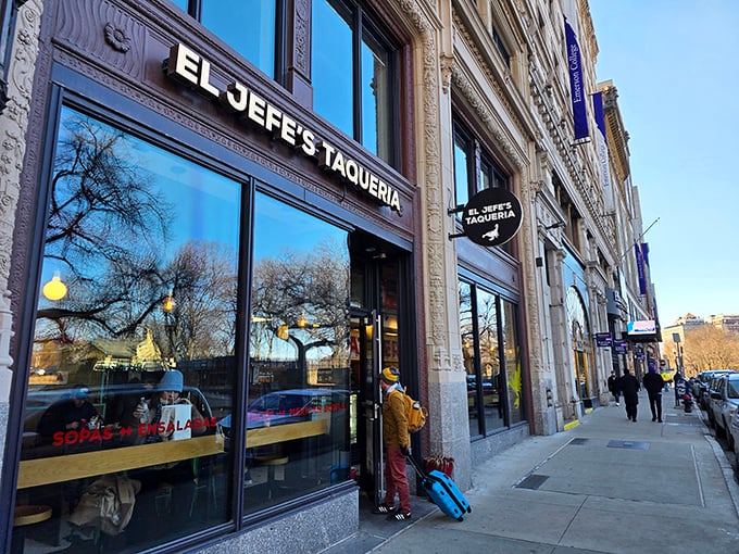 El Jefe's Taqueria nestles into Boston's historic architecture, its black circular sign beckoning hungry explorers like a taco lighthouse in a sea of brick and granite.
