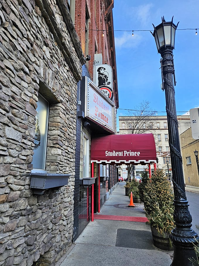 The iconic Student Prince exterior beckons with its vintage marquee, a beacon of Bavarian hospitality standing proud on Fort Street since 1935.