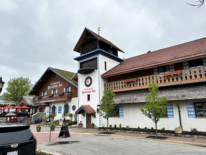 The Bavarian Inn stands like a postcard from Munich that somehow landed in Michigan, complete with clock tower and flower boxes that scream "Willkommen!"