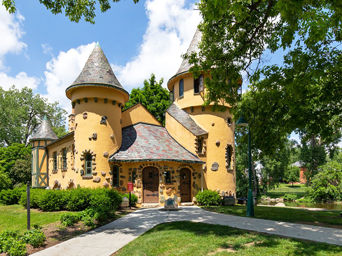 Curwood Castle's fairy-tale turrets and butter-yellow walls make it look like someone dropped a slice of medieval Europe into the Michigan countryside.