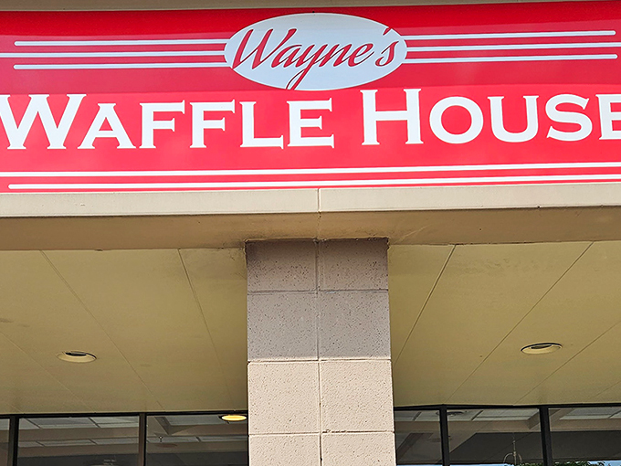 The bright red sign beckons like a lighthouse for the breakfast-starved. Wayne's Waffle House stands ready to fulfill your deepest carb fantasies. 