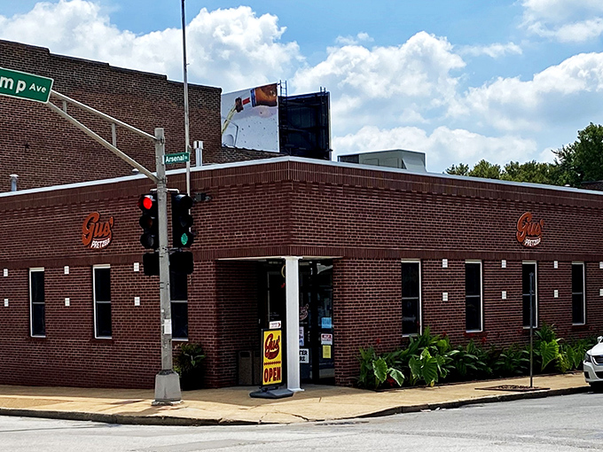 The unassuming brick exterior of Gus' Pretzel Shop stands like a carb-lover's Fortress of Solitude, quietly promising twisted delights within.
