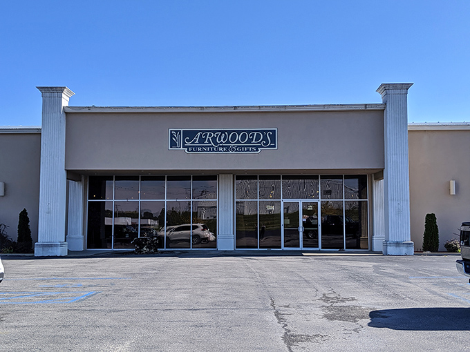 The unassuming exterior of Arwood's Furniture & Mattress hides a wonderland within, like finding a five-star restaurant in a gas station.