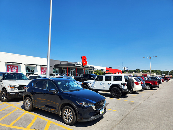 The iconic red and green sign of Mrs. B's stands like a beacon of hope for bargain hunters across Nebraska.