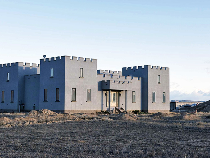 A medieval mirage rising from the Nevada desert, Paradise Ranch Castle stands defiantly against convention, its crenellated towers declaring "Yes, we built a castle in sagebrush country."
