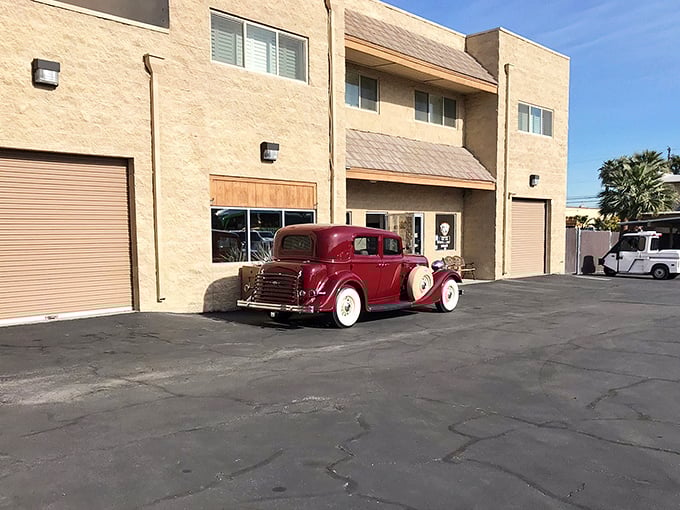 Modern muscle meets classic charm outside Nostalgia Street Rods. These gleaming Corvettes are just appetizers for the automotive feast waiting inside.