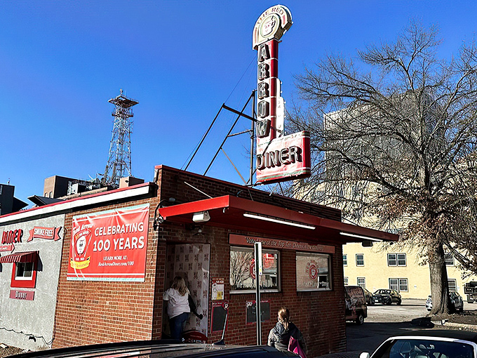 The iconic brick exterior of Red Arrow Diner proudly announces its status as a top-ten diner. Manchester's 24-hour beacon of breakfast bliss awaits hungry travelers.
