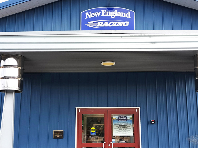 The blue-roofed North East Motor Sports Museum stands ready to welcome visitors, its unassuming exterior hiding a treasure trove of racing history within.