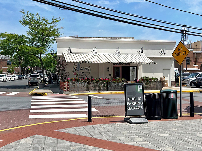 Hatch44's pristine white exterior with striped awnings isn't just inviting&mdash;it's practically winking at you to come inside for breakfast magic.